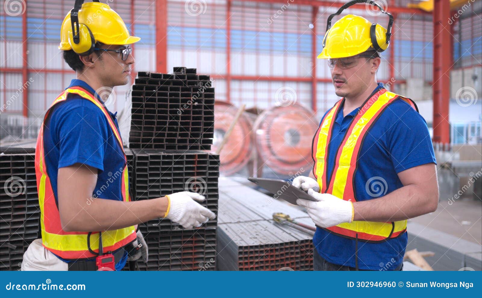 Warehouse Workers in Hard Hats and Helmets, Inspect and Count Steel ...