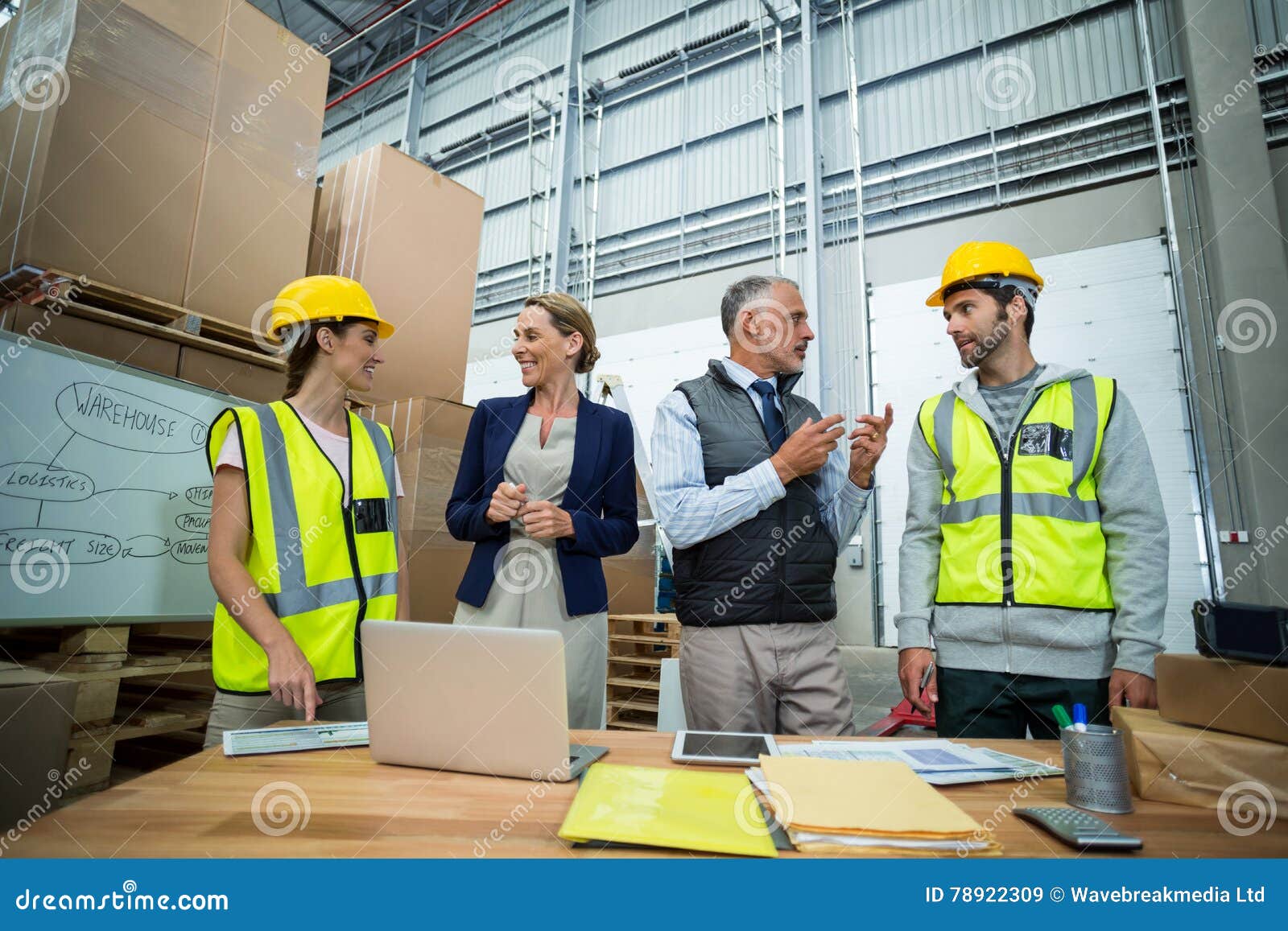 Warehouse Workers and Managers Interacting with Each Other Stock Image ...