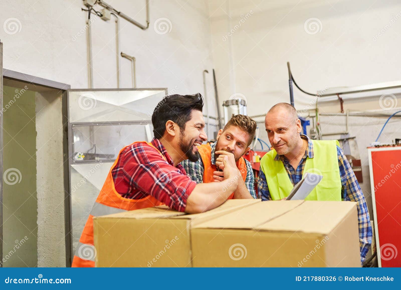 Warehouse Workers and Order Pickers Plan an Order Stock Photo - Image ...