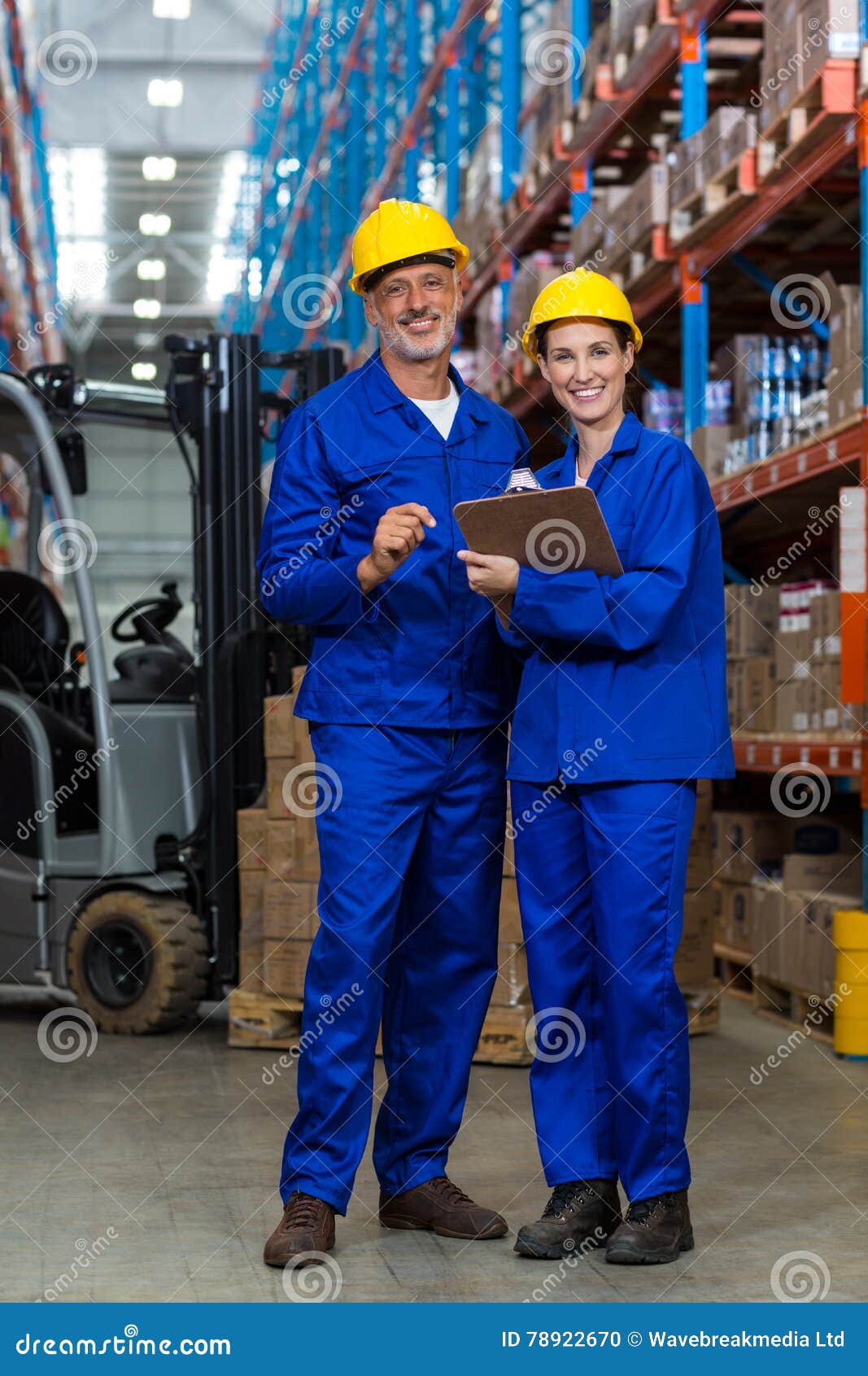 Warehouse Workers Standing Together in Warehouse Stock Photo - Image of ...