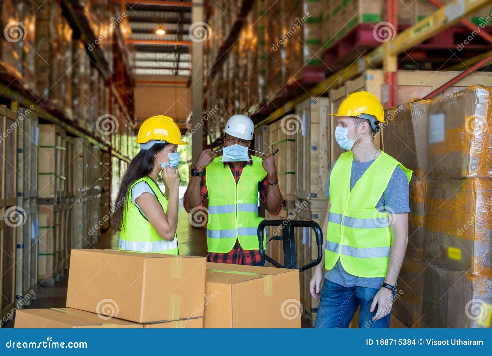 Warehouse Workers Wearing Protective Mask To Protect Against Covid-19 ...