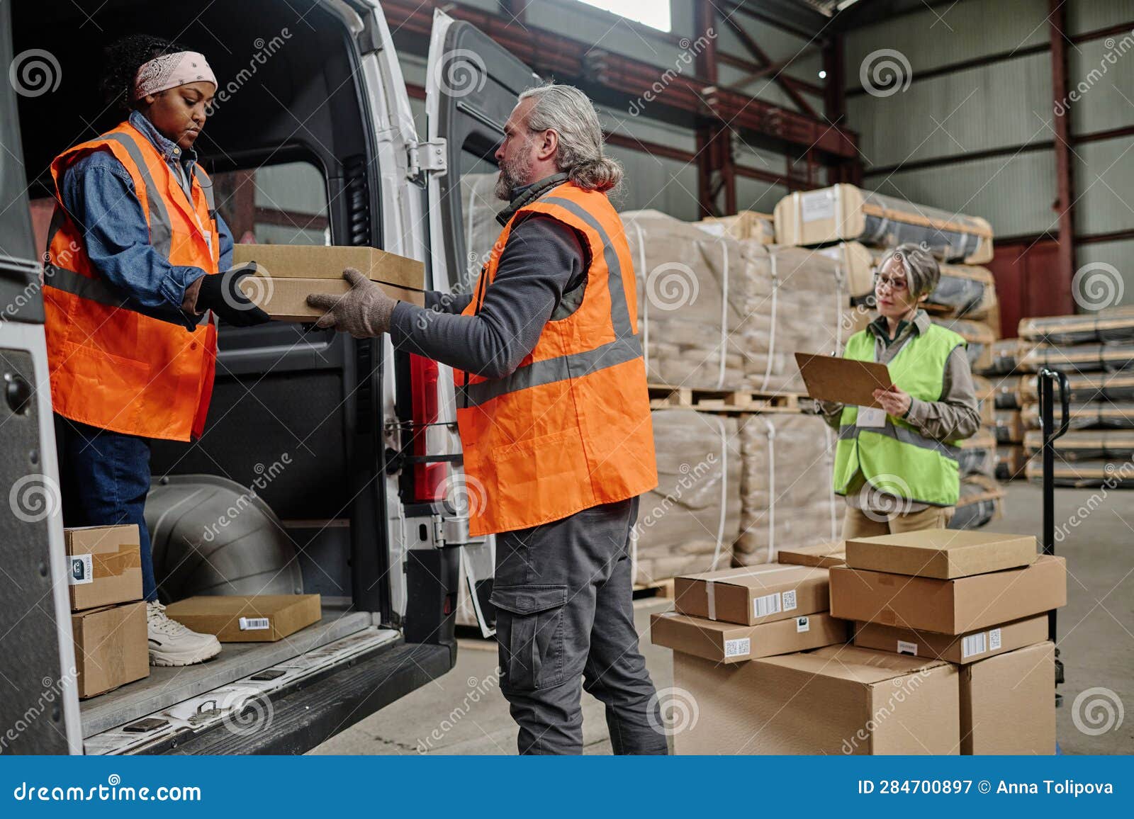 Warehouse Workers Working in Team Stock Image - Image of cargo, vehicle ...