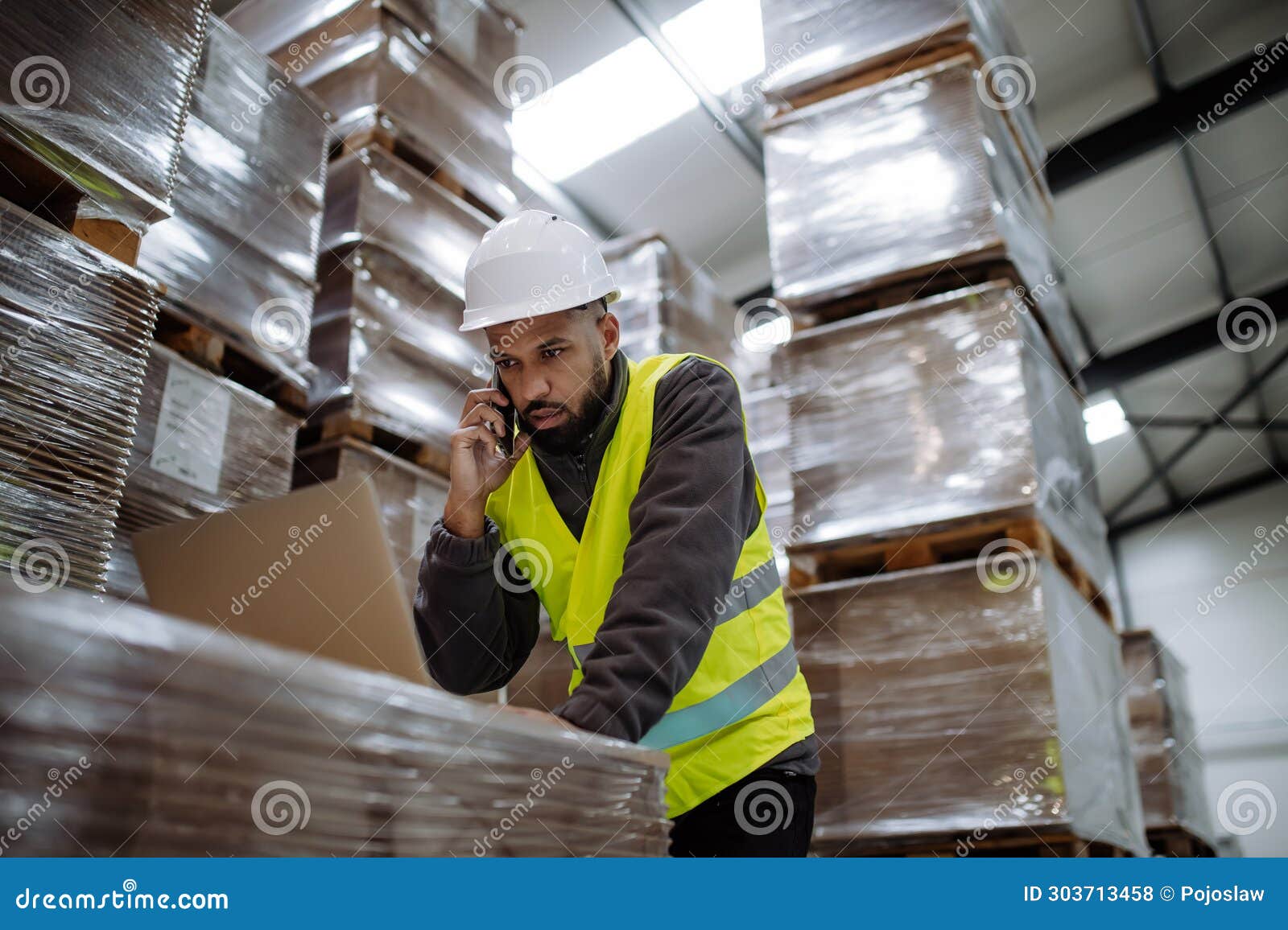 Warehouseman Checking Delivery, Stock in Warehouse on Computer, Pc ...