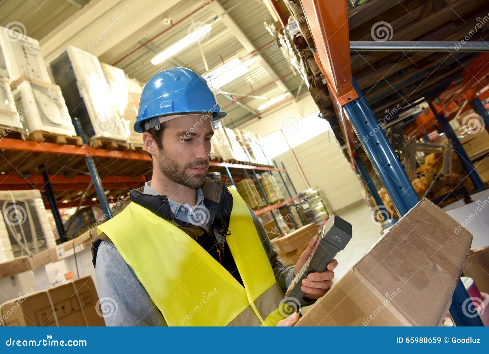 Warehouseman Scanning Products Stock Image - Image of helmet ...
