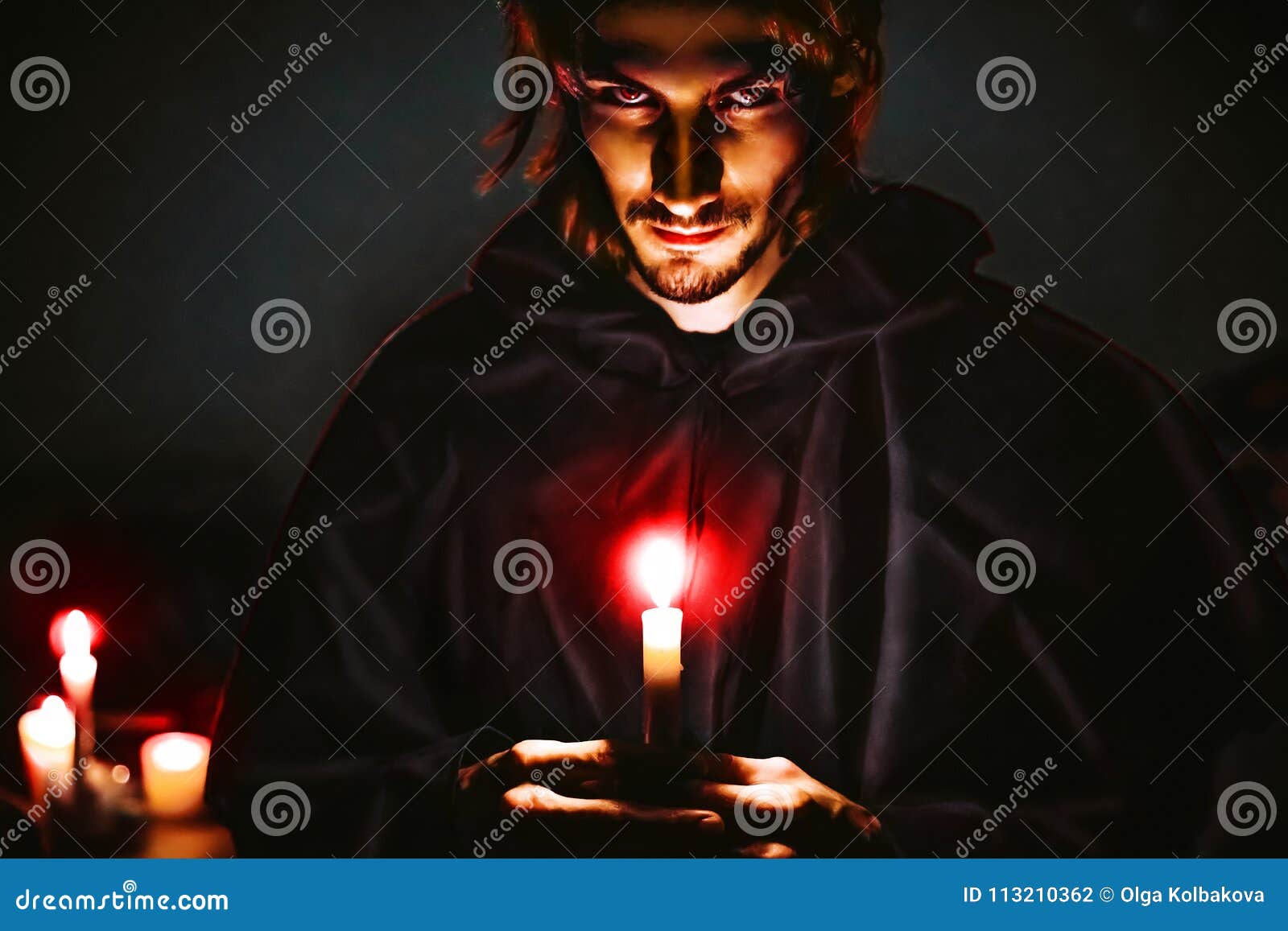 Evil Sorcerer with a Candle Stock Photo - Image of cruel, demons: 113210362