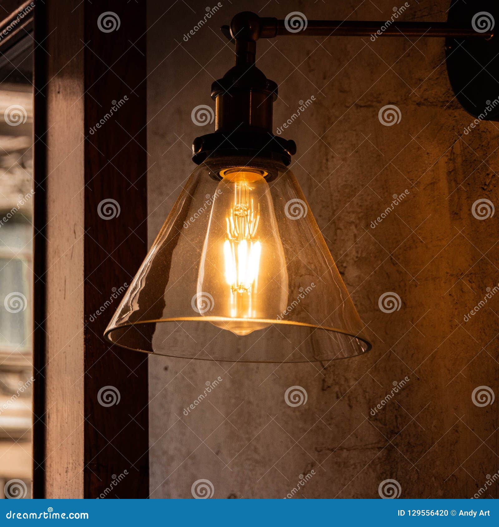 Warm cafe lightbulb light stock photo. Image of atmospheric - 129556420