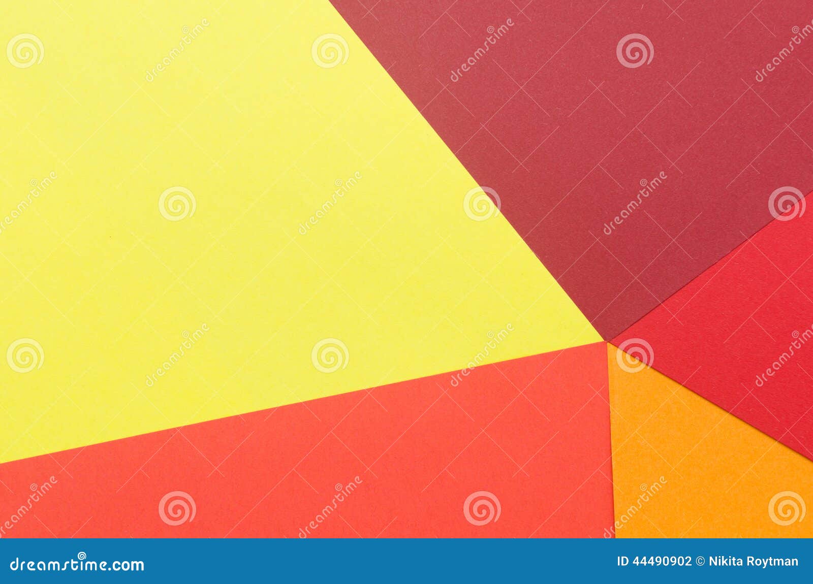 Warm-colored Paper Sheets Forming Triangles Stock Photo - Image of ...