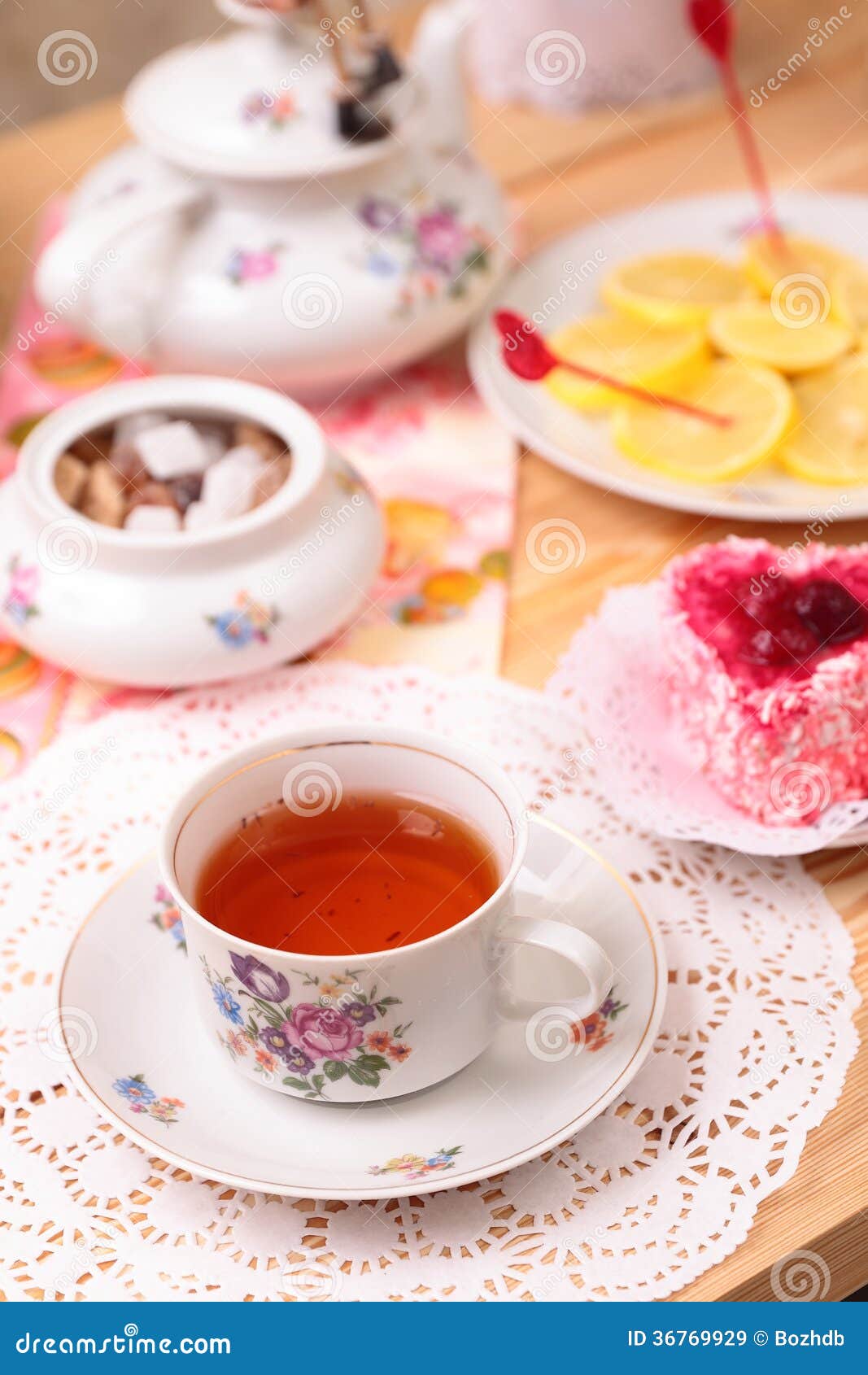 Warm cup of tea and sweets stock image. Image of party - 36769929