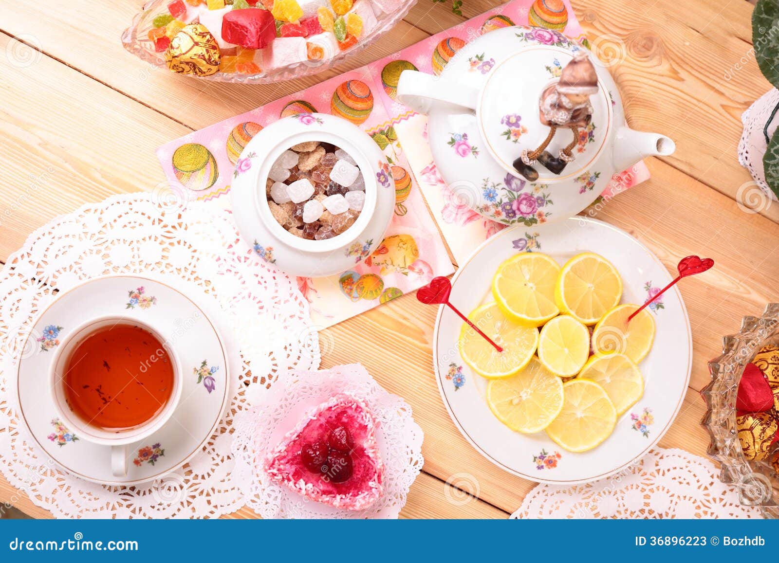 Warm cup of tea and sweets stock image. Image of design - 36896223