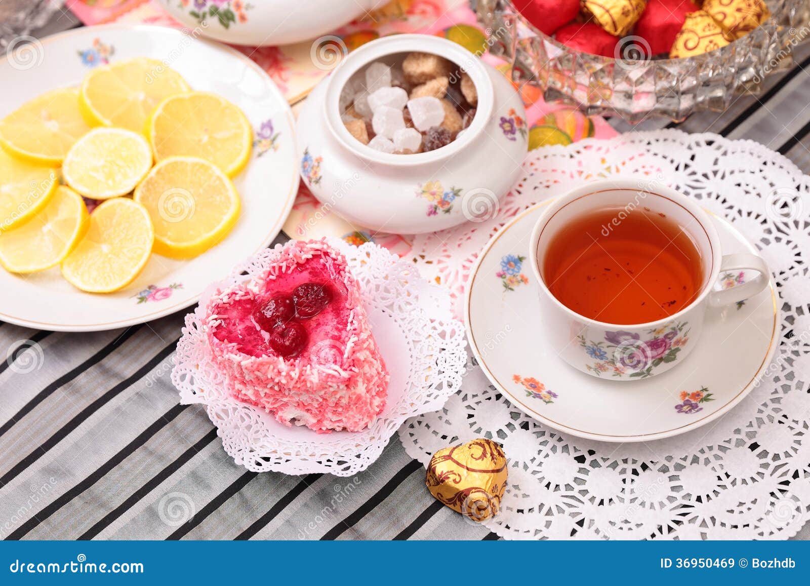 Warm cup of tea and sweets stock image. Image of rest - 36950469