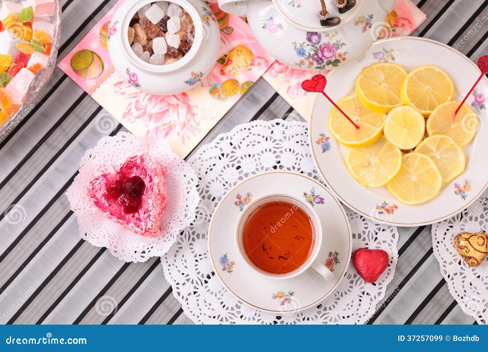Warm cup of tea and sweets stock image. Image of rest - 37257099
