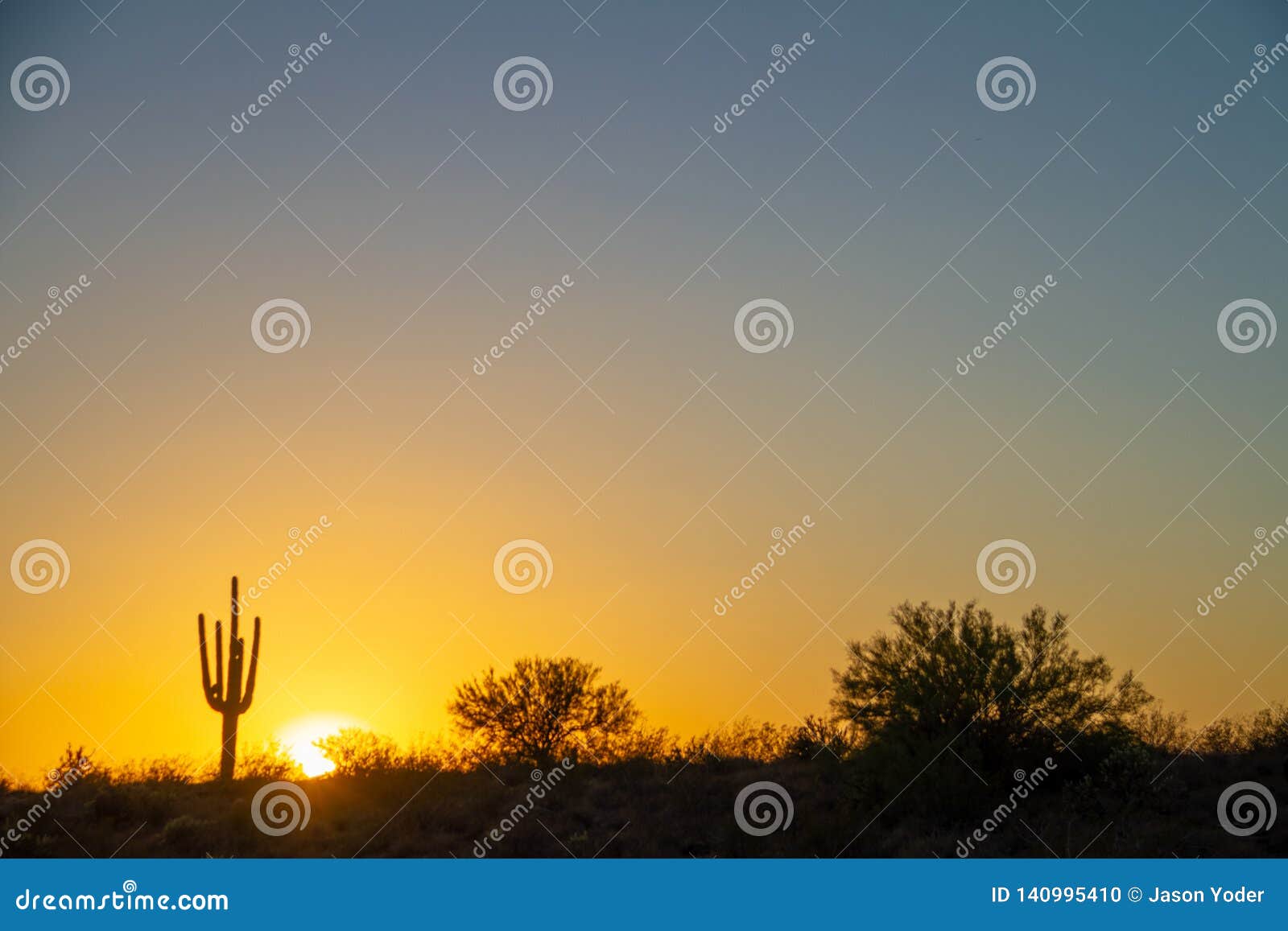 A Warm Desert Sunset Under a Cloudless Sky Stock Photo - Image of ...