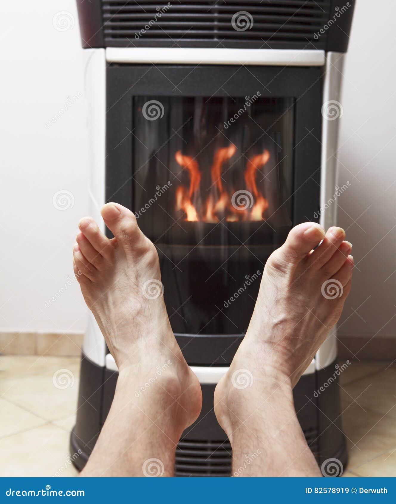 Warm feet in front of fire stock image. Image of socks - 82578919