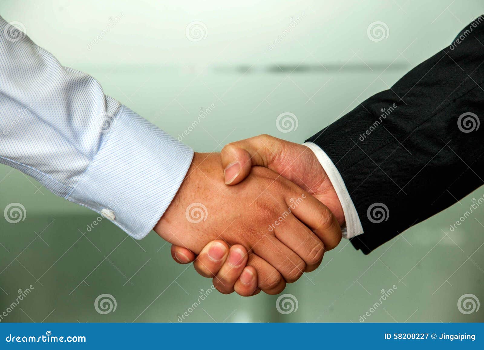 Warm handshake stock image. Image of friendship, dresses - 58200227