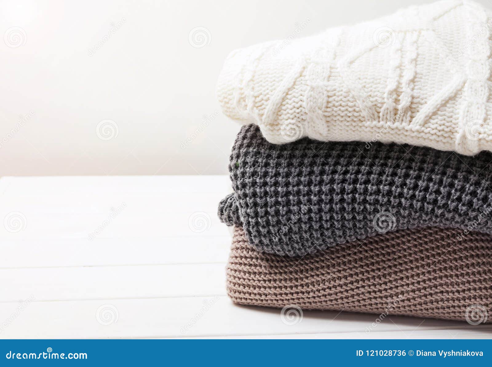 Warm Knitted Winter Sweaters in Stack Stock Photo - Image of concept ...