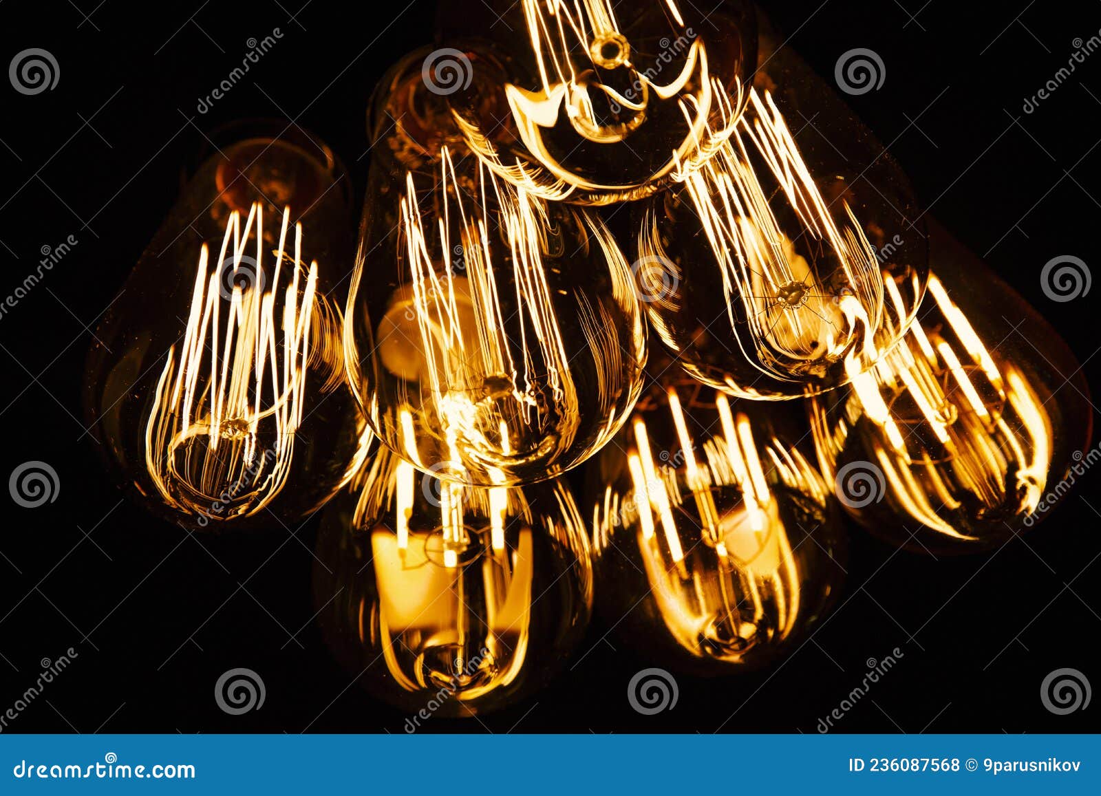 Warm Light Bulb, Close Up of Filaments Inside Stock Photo - Image of ...
