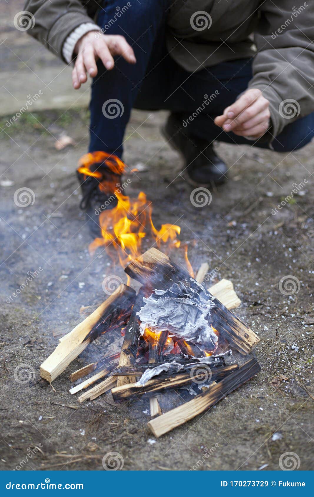 Warm Your Hands by the Fire. the Guy is Trying To Get Rid of the Cold ...