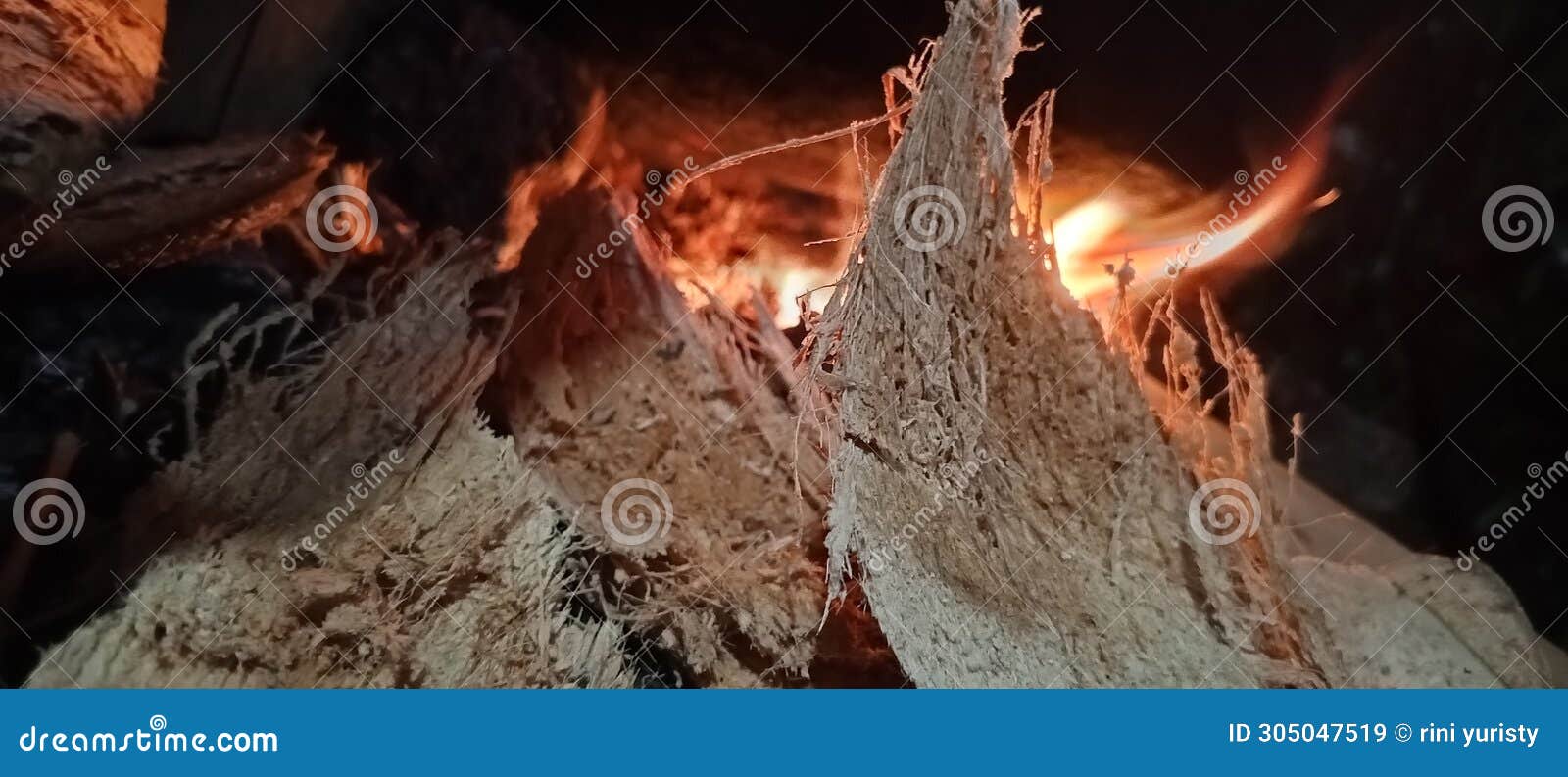 Warm Yourself by Burning in the Fire Made of Coconut Fiber. Stock Image ...