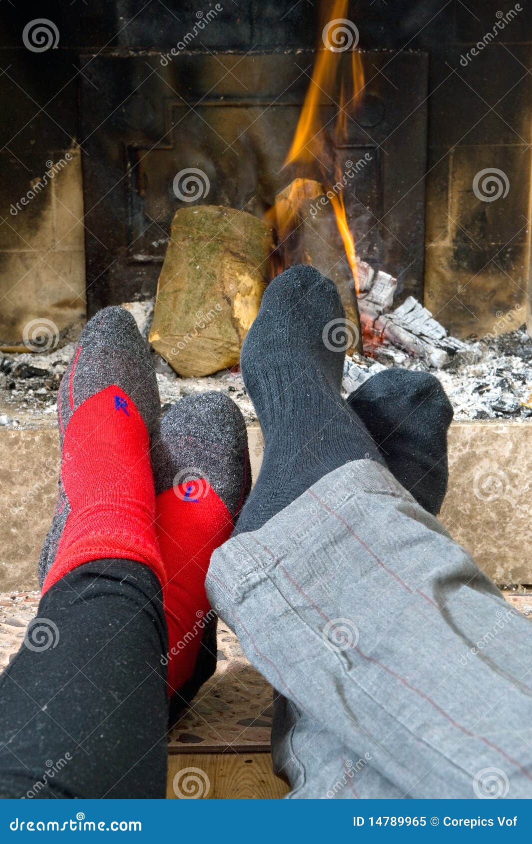 Warming by the fire stock image. Image of fireside, couple - 14789965