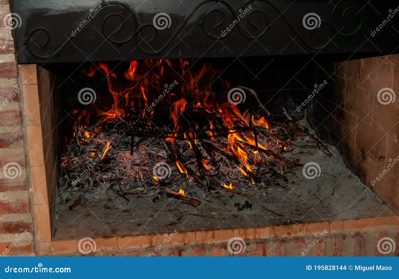 Warming a Grill Inside a Chimney To Make a Barbecue Stock Photo - Image ...