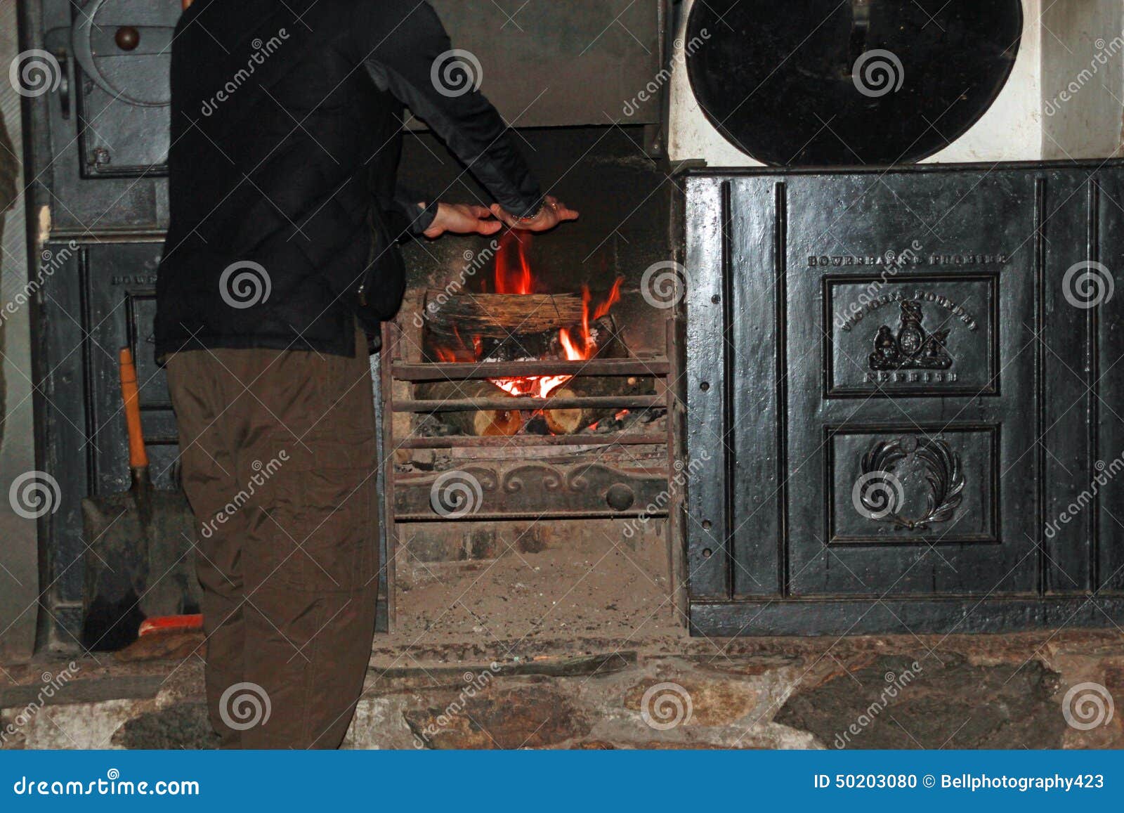 Warming Hands on an Old Fashioned Log Fire Stock Photo - Image of ...