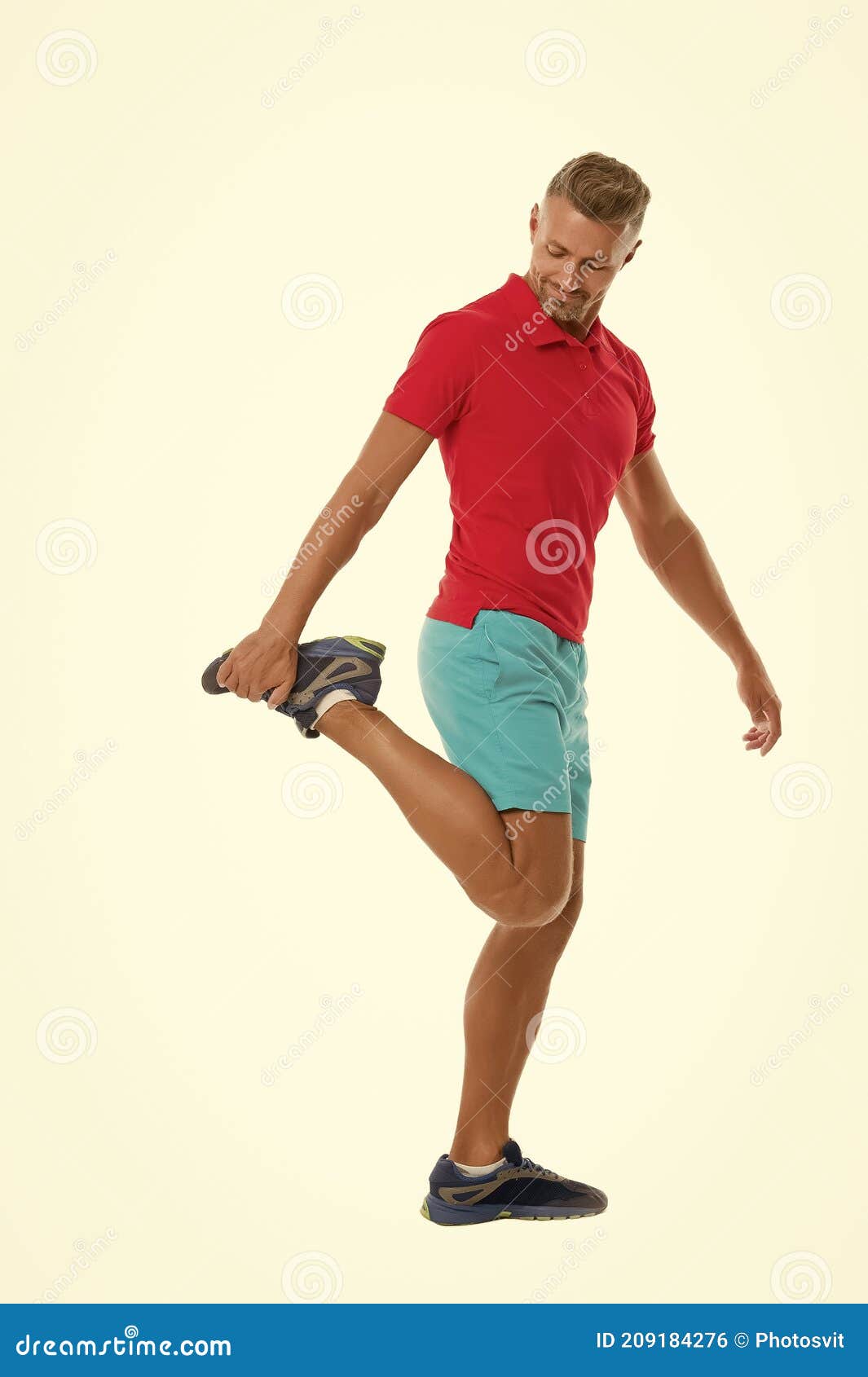 Warming Up with Some Stretches. Athletic Man Stretching Isolated on ...