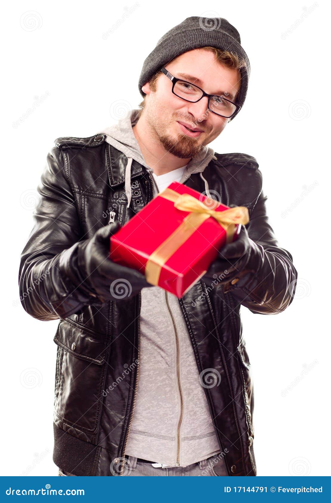 Warmly Dressed Young Man Handing Wrapped Gift Out Stock Image - Image ...