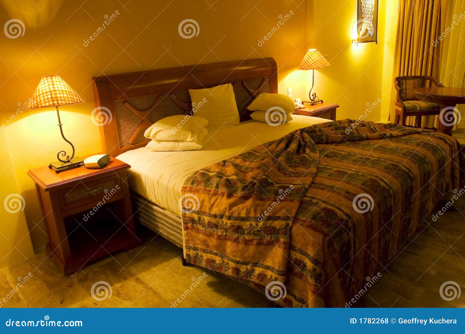 Warmly Lit Bedroom stock photo. Image of relax, rest, lights - 1782268