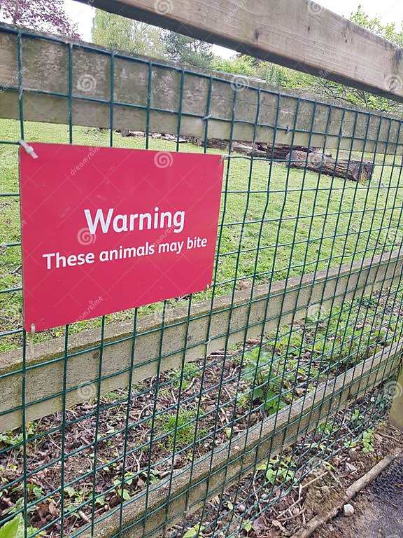 Warning these Animals May Bite Sign. Stock Photo - Image of warning ...
