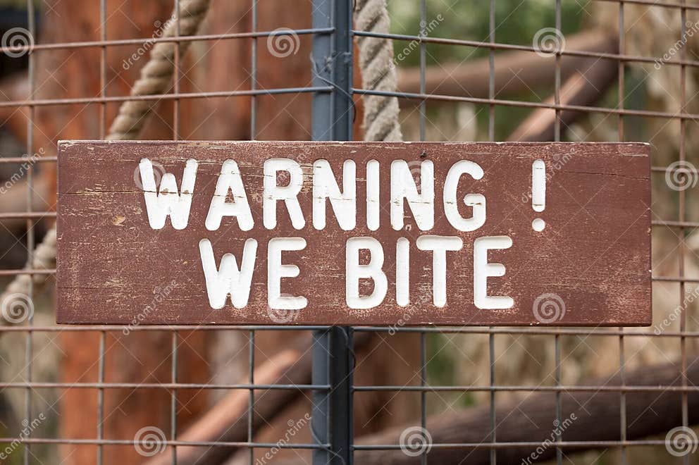 Warning we Bite stock photo. Image of safety, risk, text - 32393140