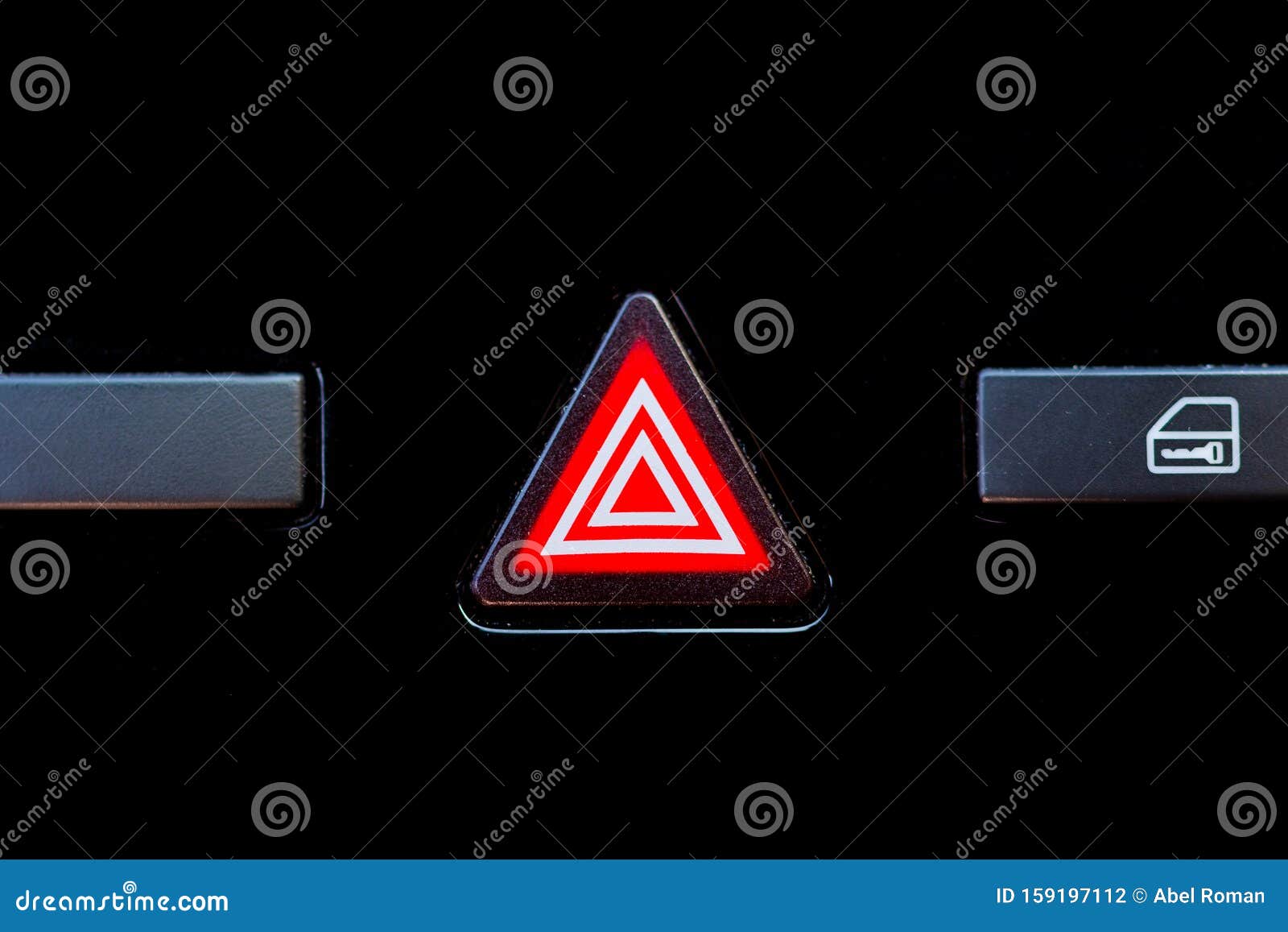 Warning Button Illuminated on the Dashboard of a Car Stock Photo ...