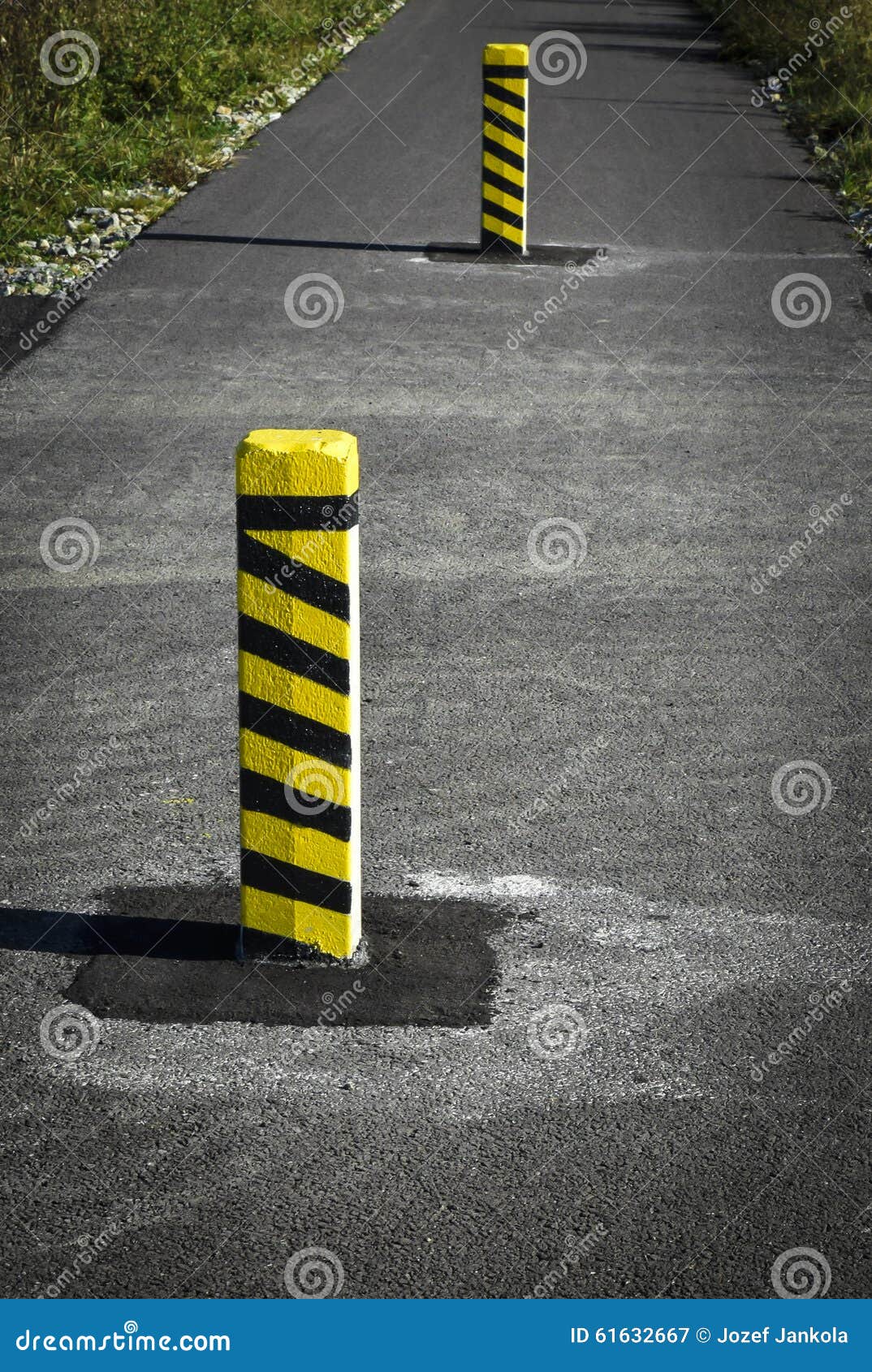 Warning Concrete Pillars on the Road Stock Image - Image of outdoors ...
