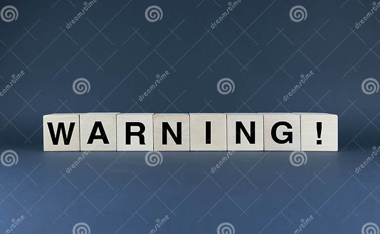 Warning. Cubes Form the Word Warning Stock Photo - Image of background ...
