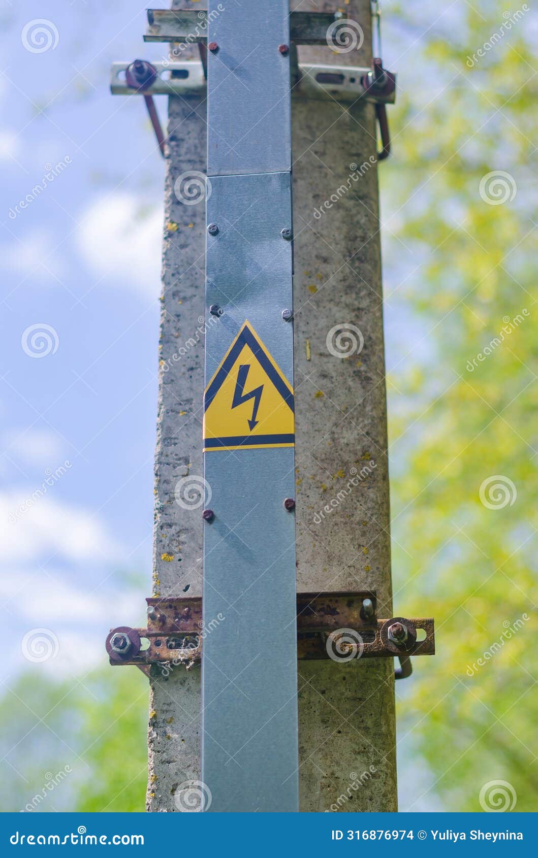 Warning High Voltage Electrical Sign on High Voltage Pole Stock Photo ...