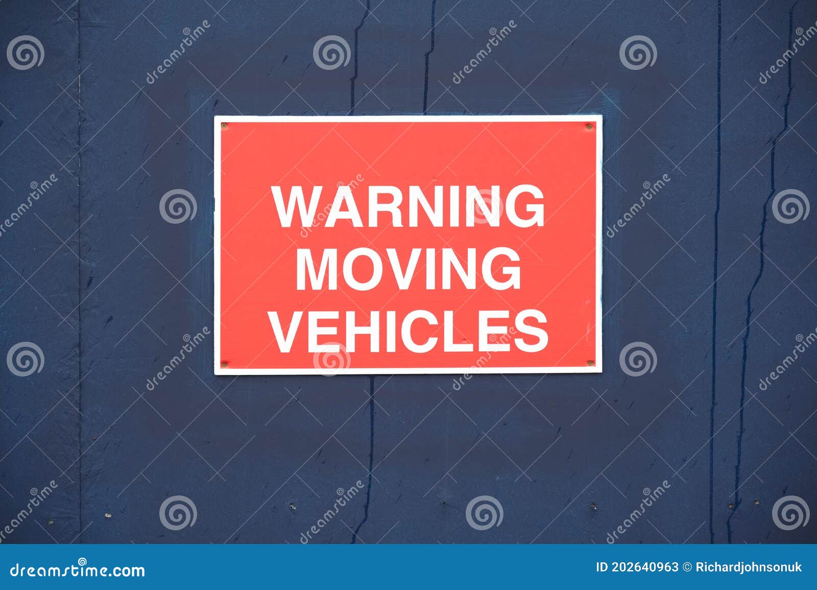 Warning Moving Vehicles Sign at Construction Site Stock Image - Image ...