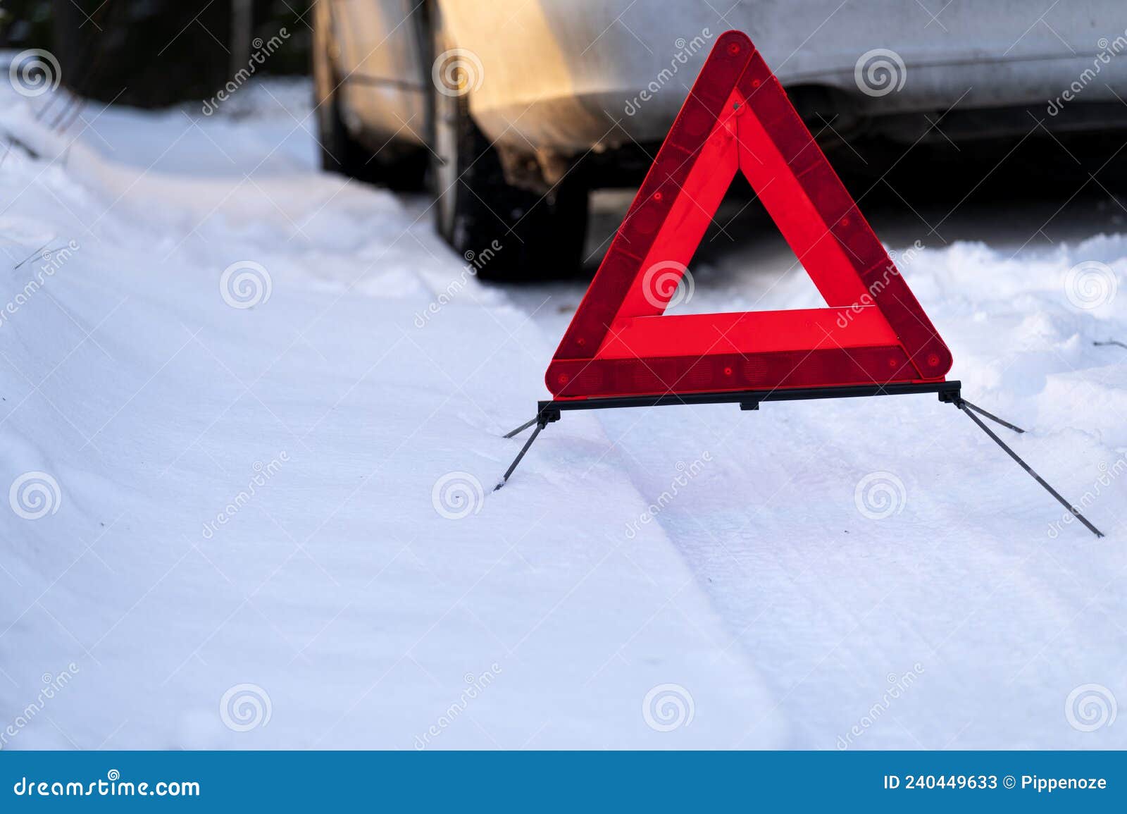 Warning Red Triangle Sign and Car Trapped in Snow in Winter Day Stock ...