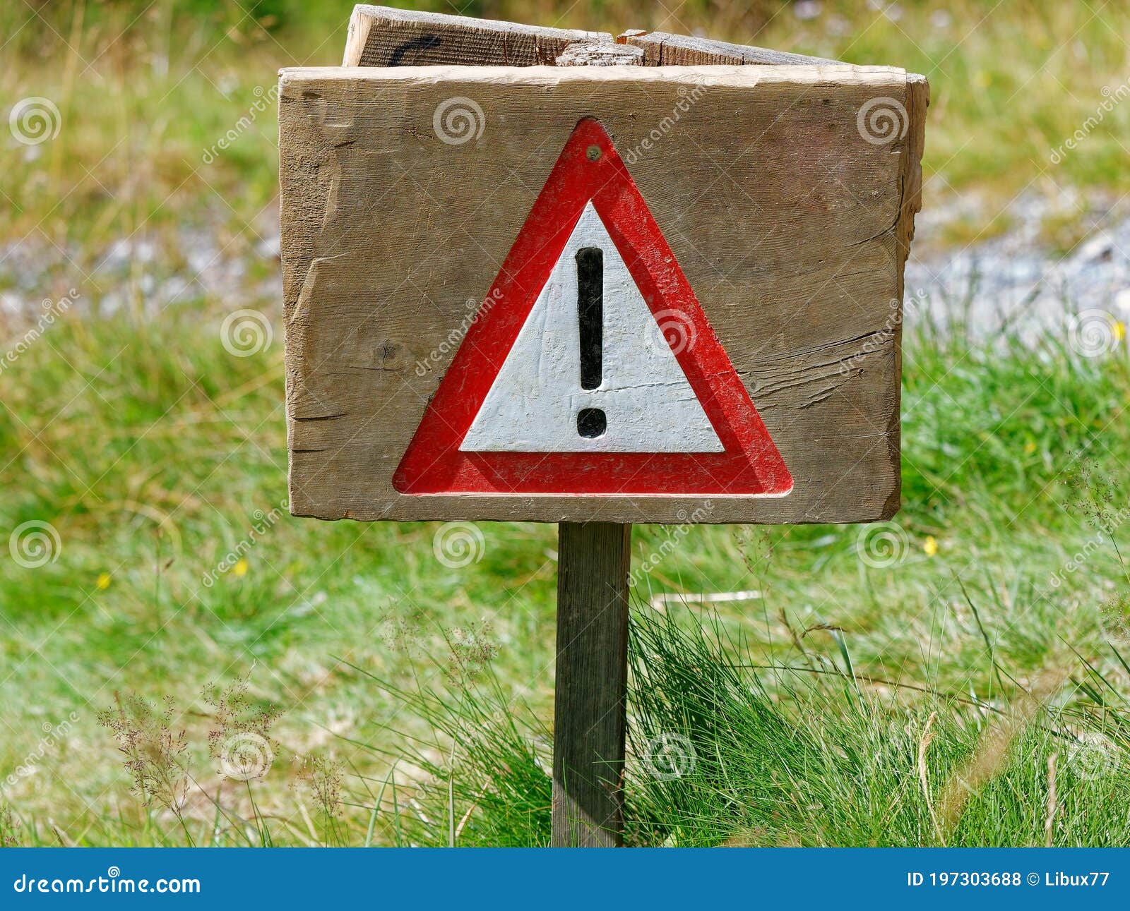Warning Road Sign with an Exclamation Mark in Red Triangle on Mountain ...