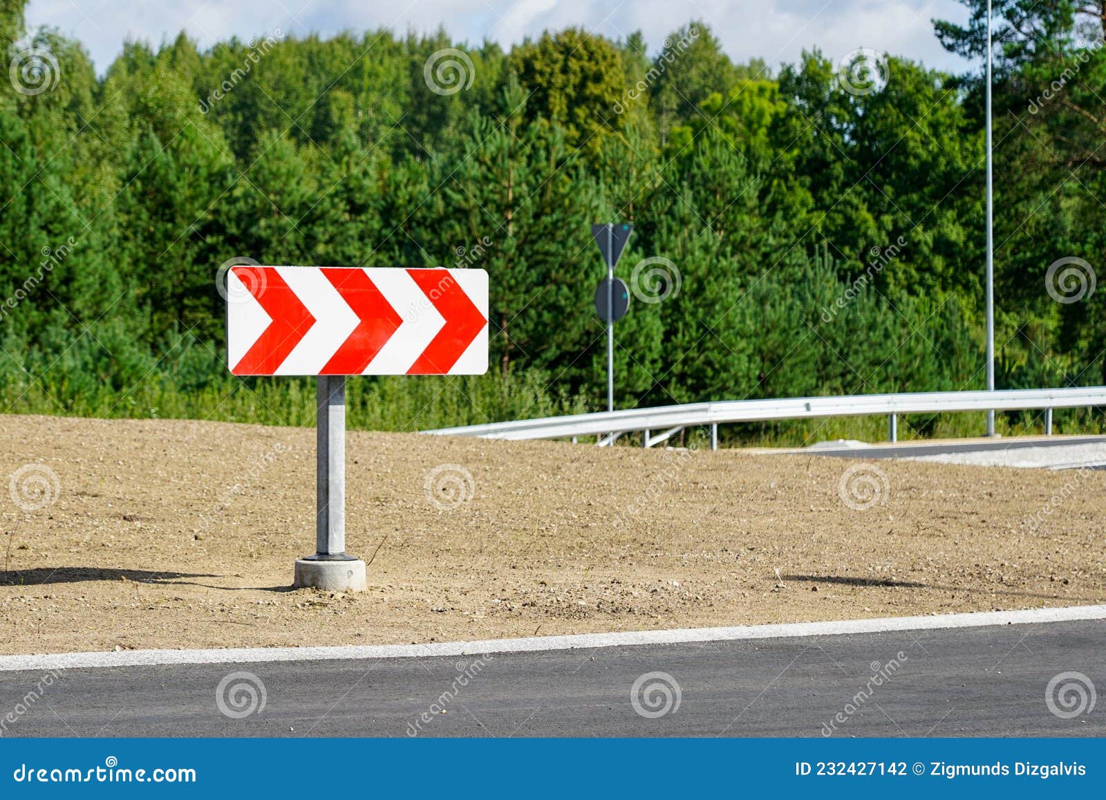 Warning Road Sign with Red and White Arrows before a Dangerous Turn ...