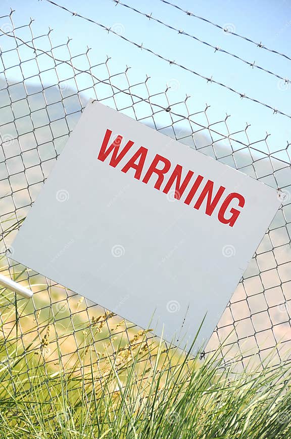 Warning sign stock photo. Image of barbed, warn, intruder - 5501492