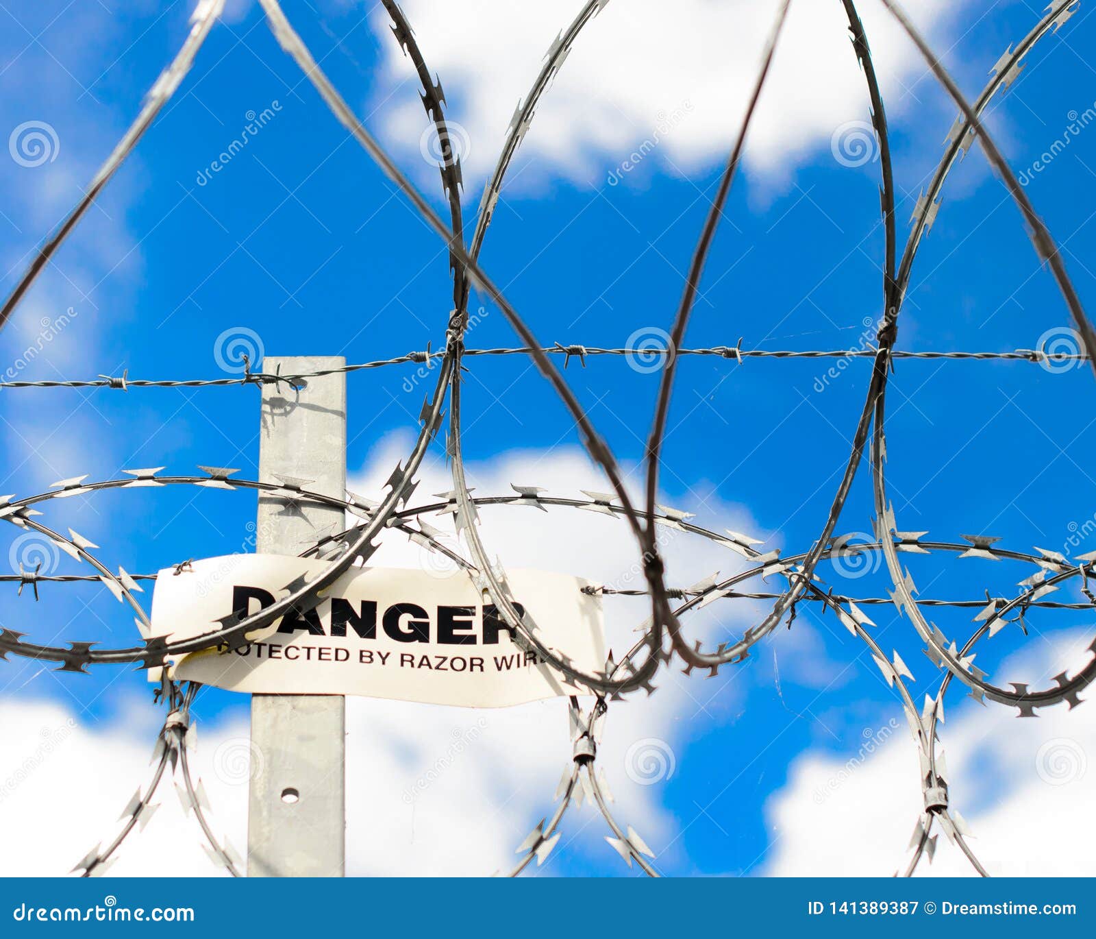 Warning Sign and Barbed Wire Stock Image - Image of iron, warning ...