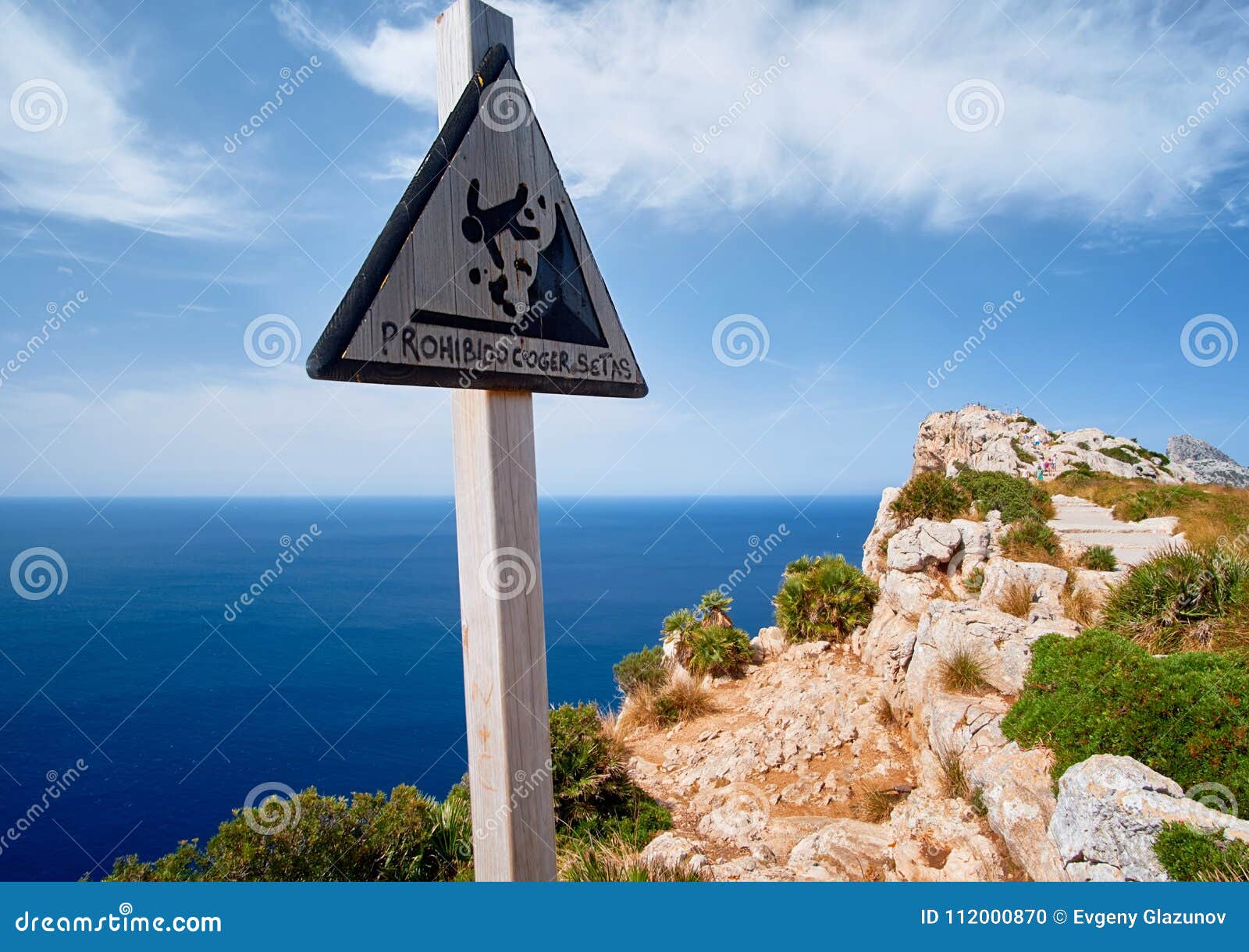 Warning Sign. the Danger of Falling Warning Sign on a Steep Mountain ...