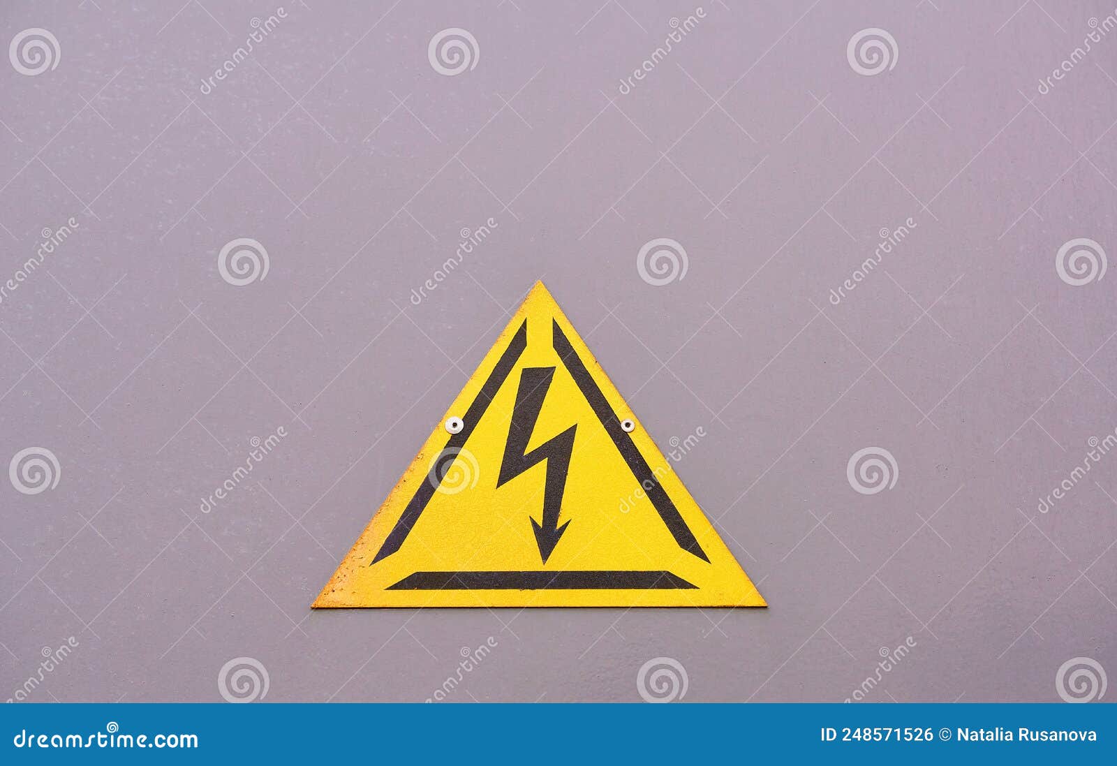 A Warning Sign of Danger on a Purple Background. Stock Photo - Image of ...