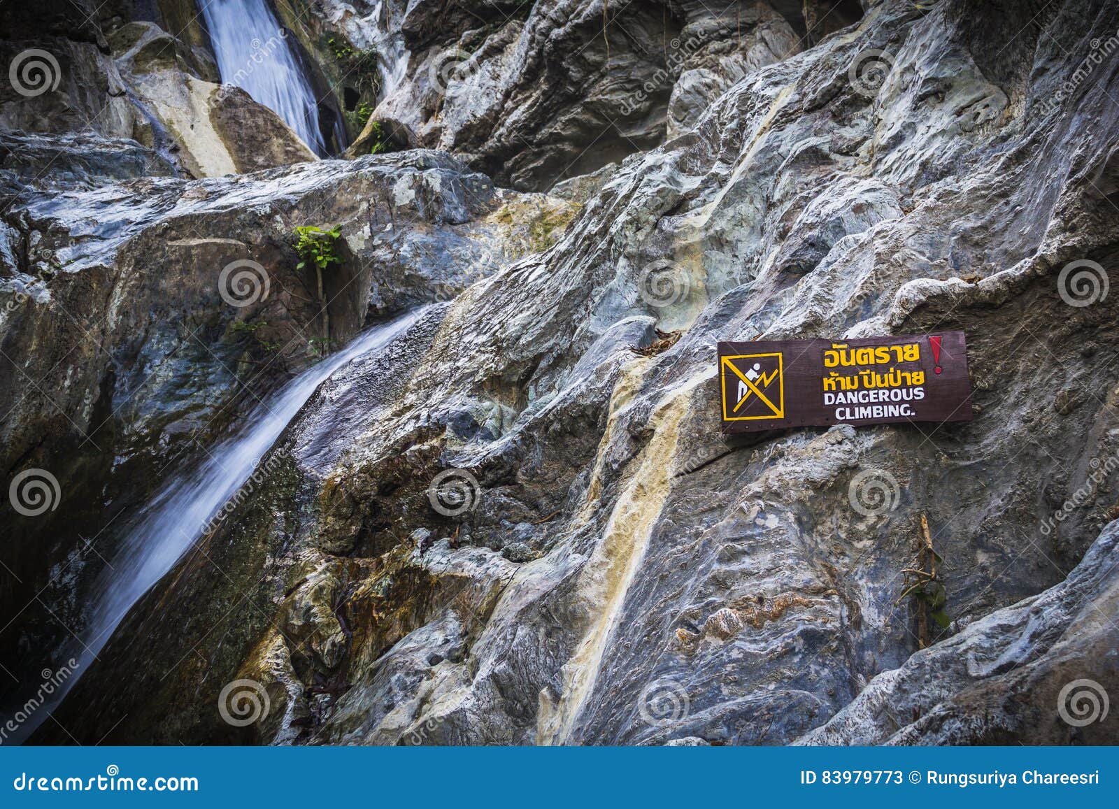 Warning Sign Dangerous Climbing at Waterfall with Stones. Stock Image ...