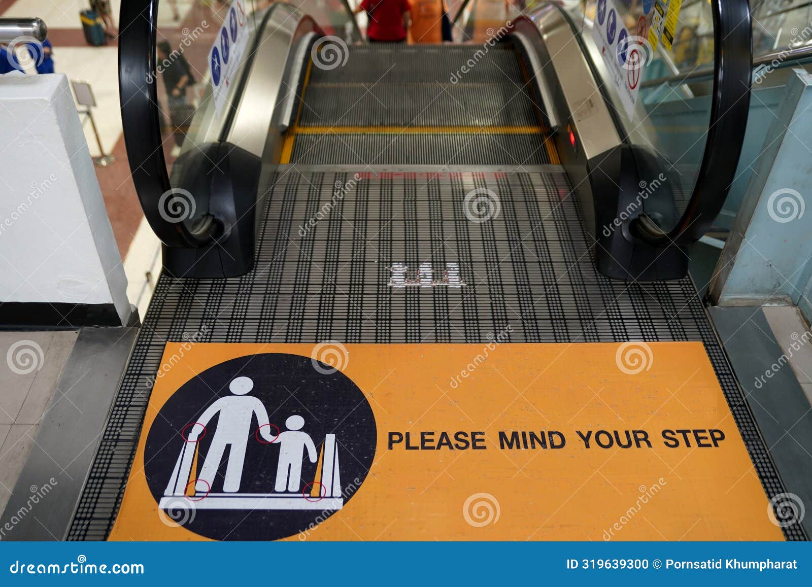 Warning Sign on the Escalator for Safety Stock Photo - Image of safety ...