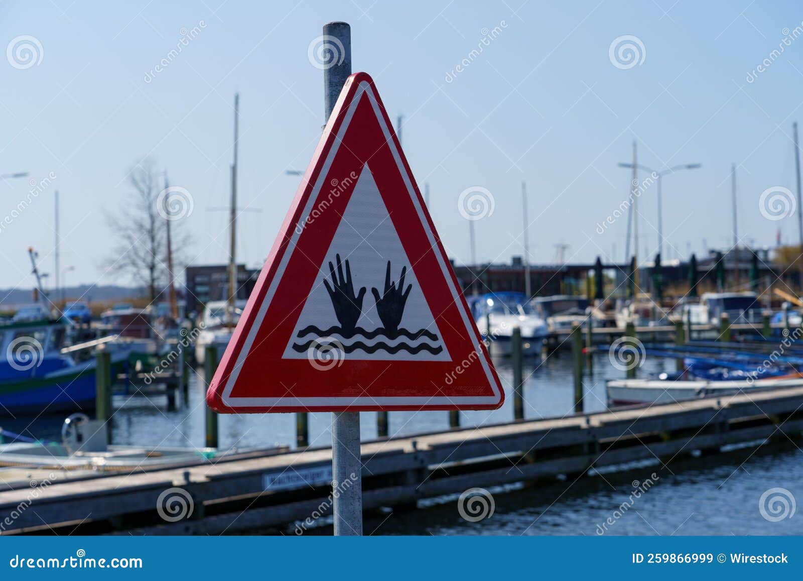 Warning Sign on a Harbor in a Triangular Shape with a Red Border Stock ...