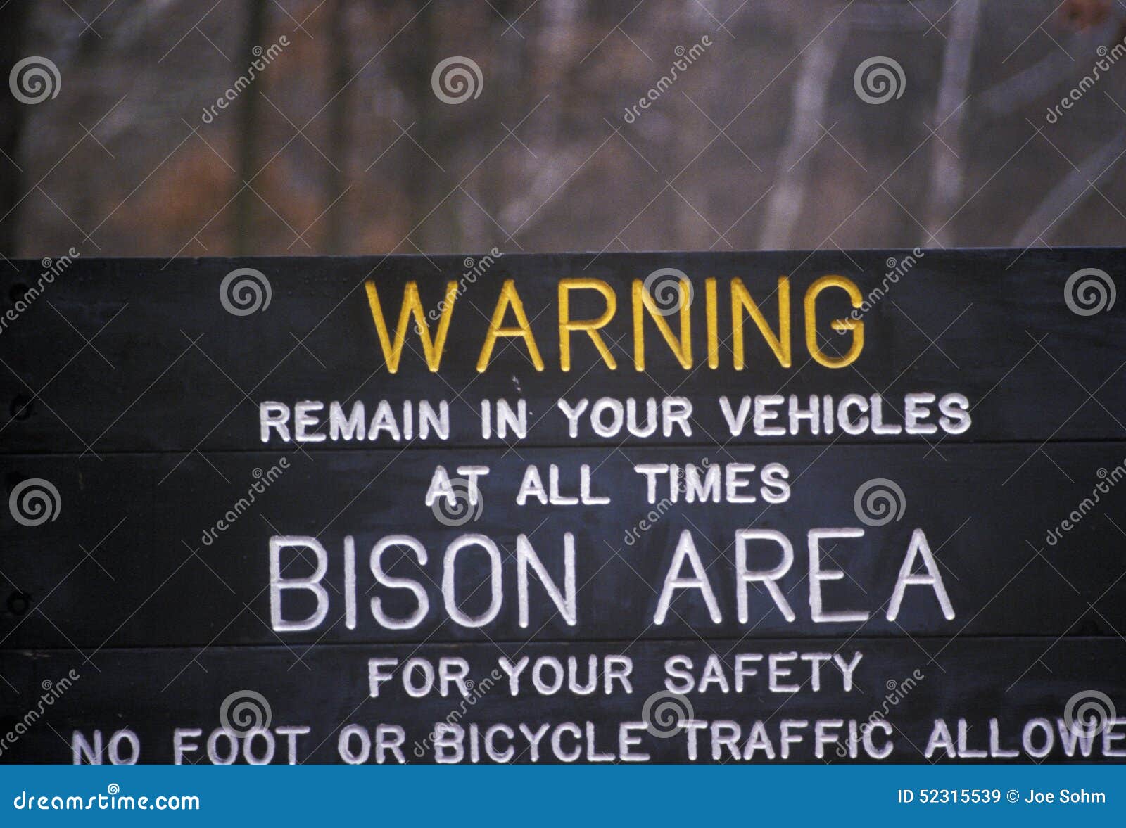Warning Sign at Lone Elk Park, MT Regarding Bison Stock Image - Image ...