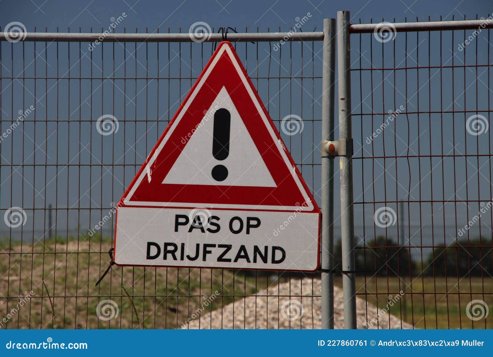 Warning Sign for Quicksand at Construction Site on Fence Editorial ...