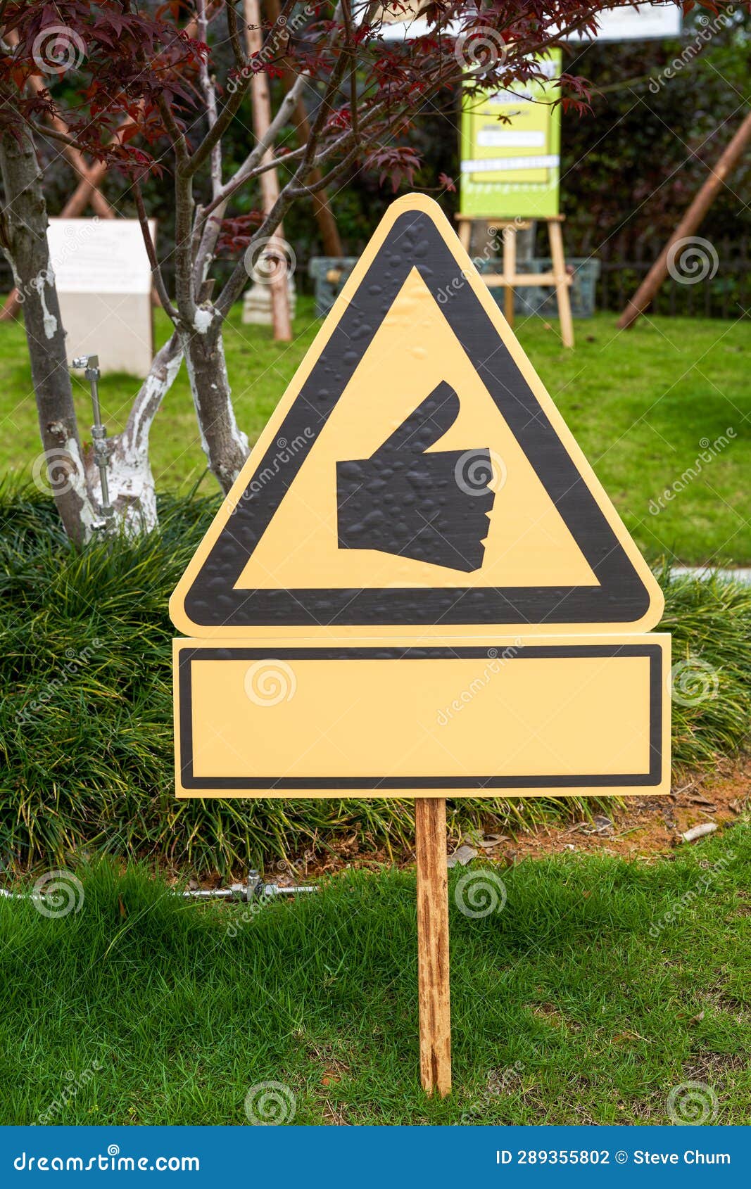 A Warning Sign with a Thumbs Up Like Sign Stock Photo - Image of ...