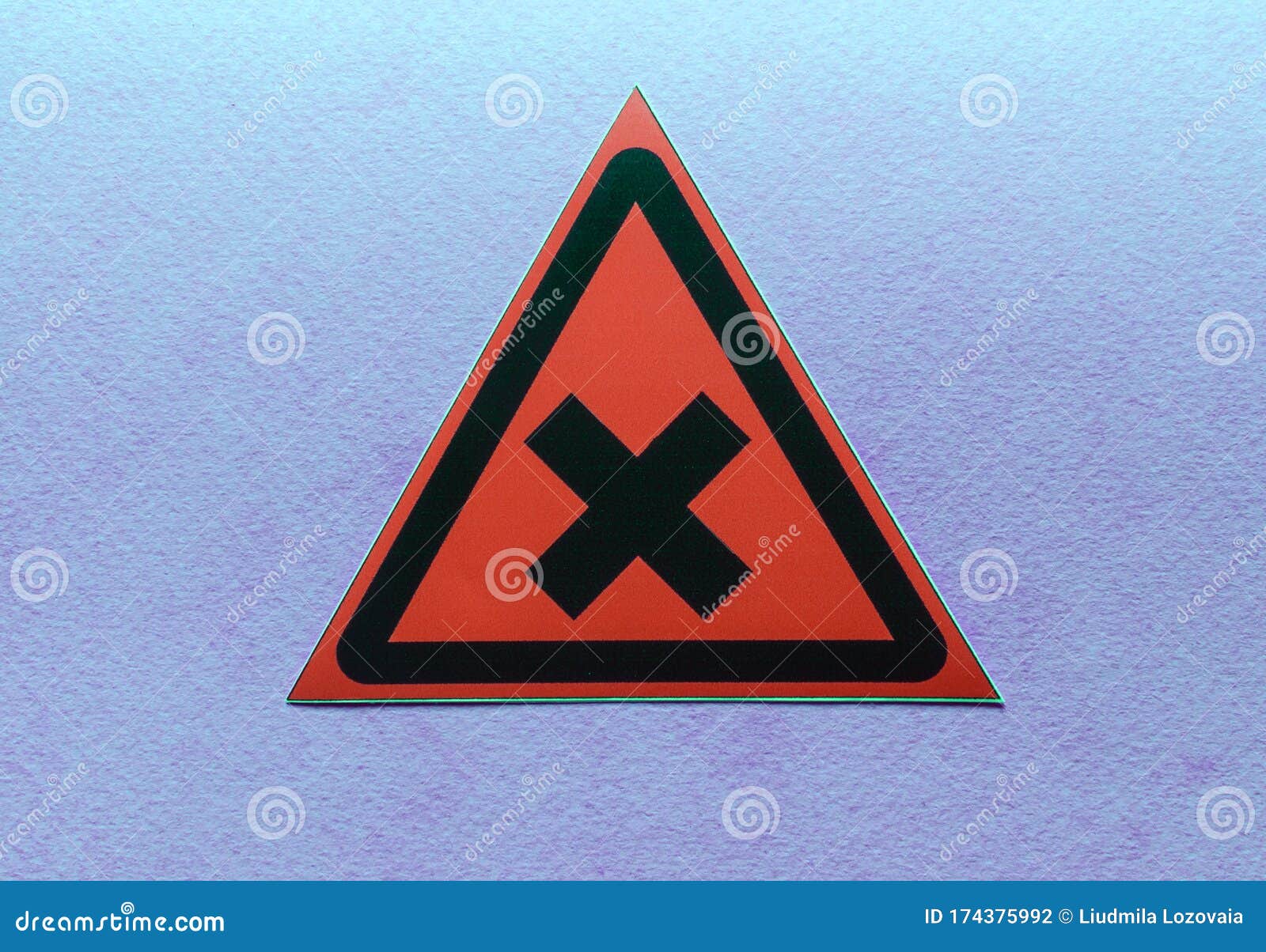 Warning Sign Two Intersecting Lines in a Red Triangle on a Blue ...