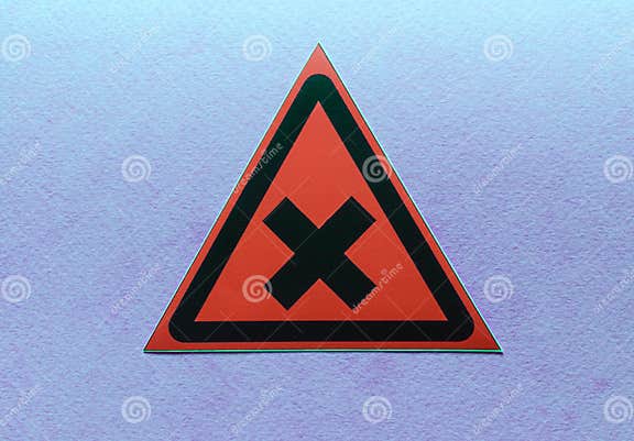 Warning Sign Two Intersecting Lines in a Red Triangle on a Blue ...